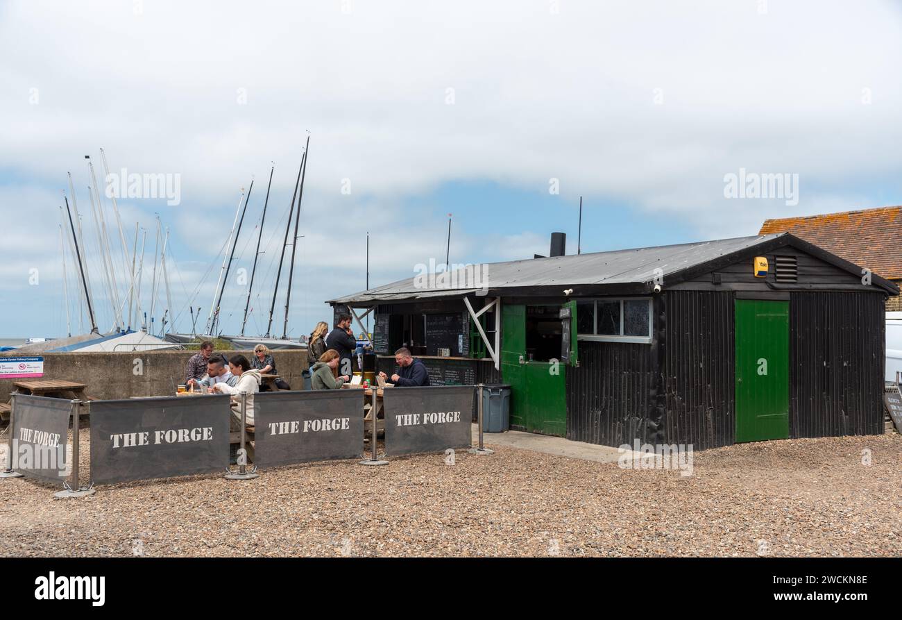 People eating at fast fish food traditional local restaurant in ...