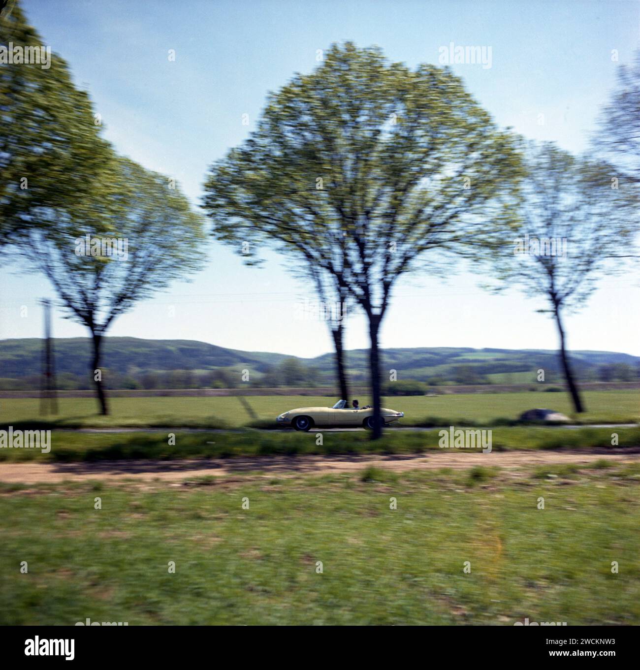 1967 Jaguar E-type, convertible, Pale Primrose Yellow, S1 1/2 driving ...