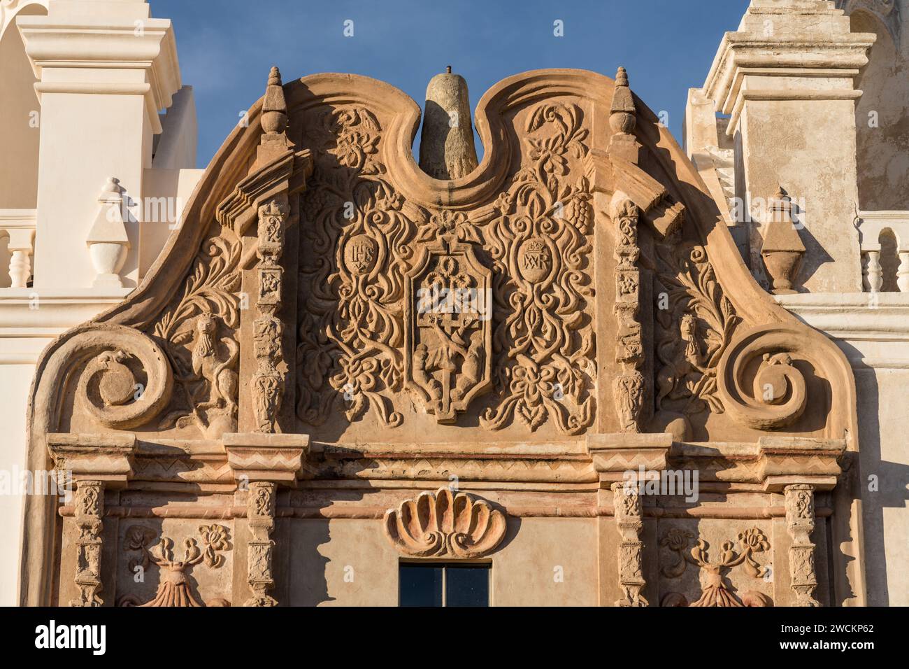 Carved emblem of the Franciscan order and Scalloped shell of Pilgrimage ...