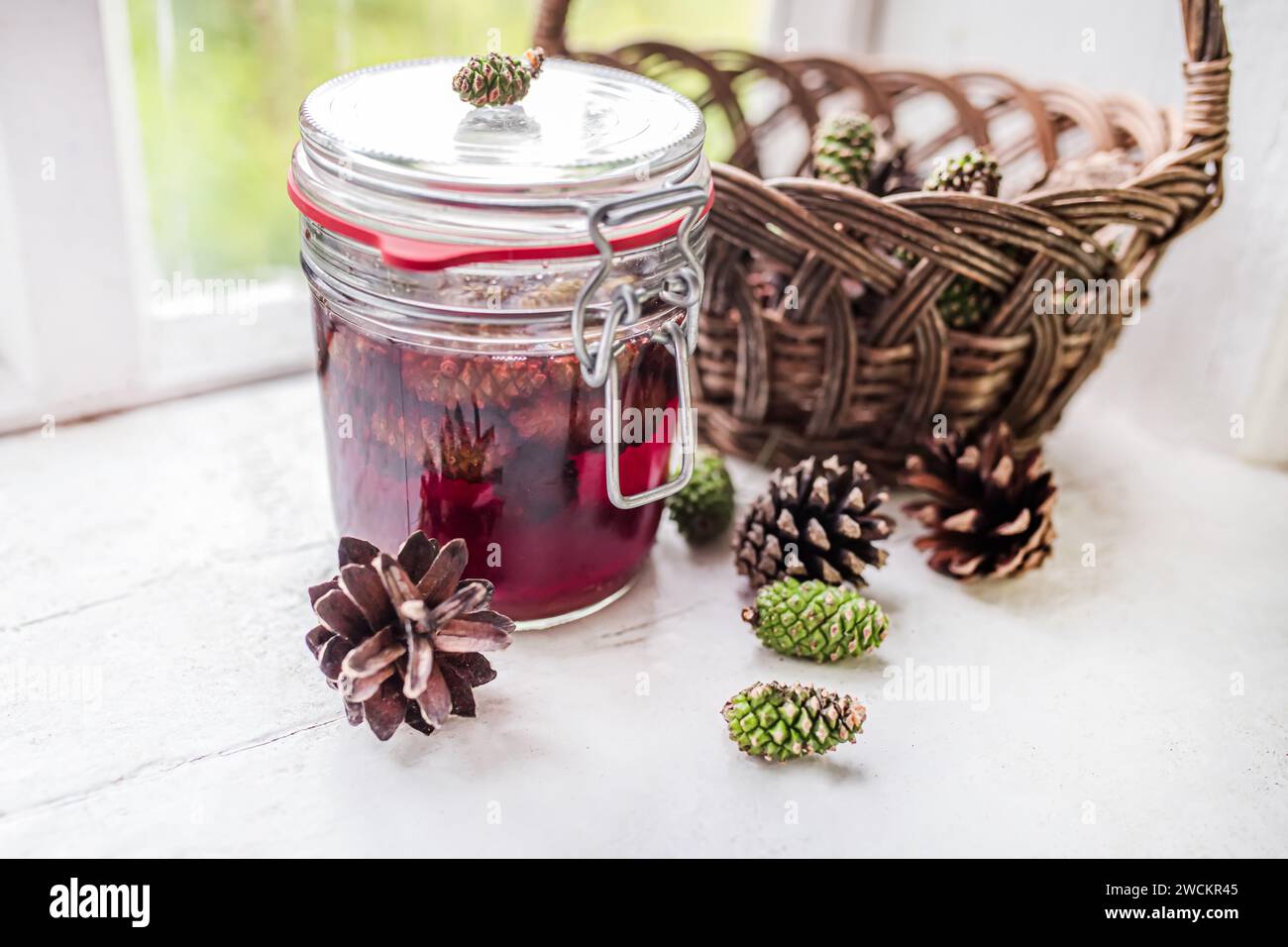 jar of pine cone jam, a natural remedy for a sore throat, and a ...