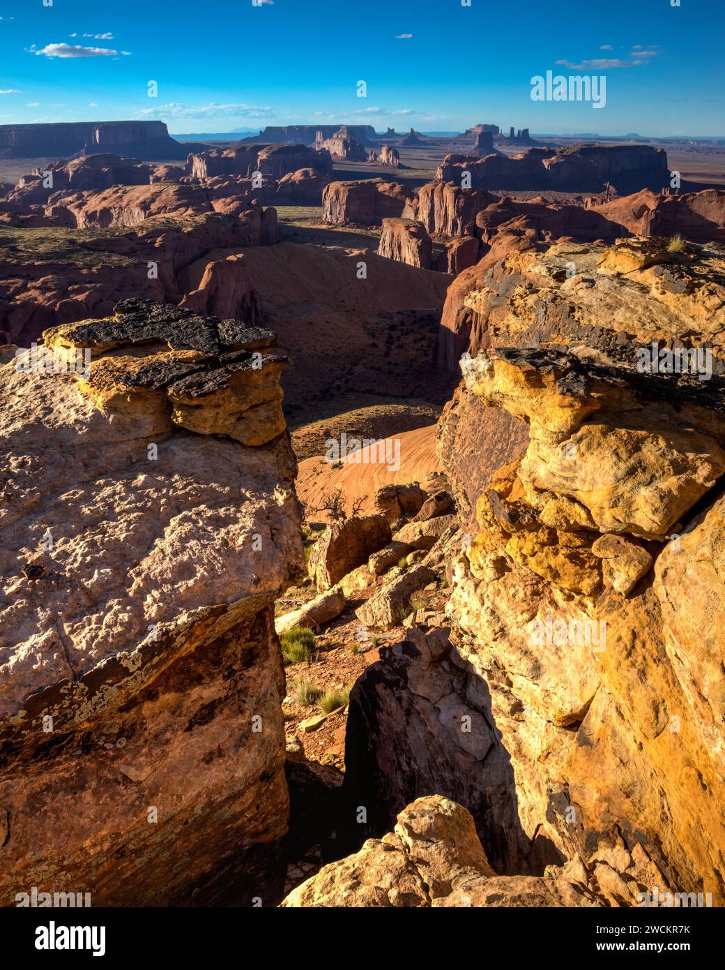 Unusual sandstone formation on Hunt's Mesa with Monument Valley behind ...