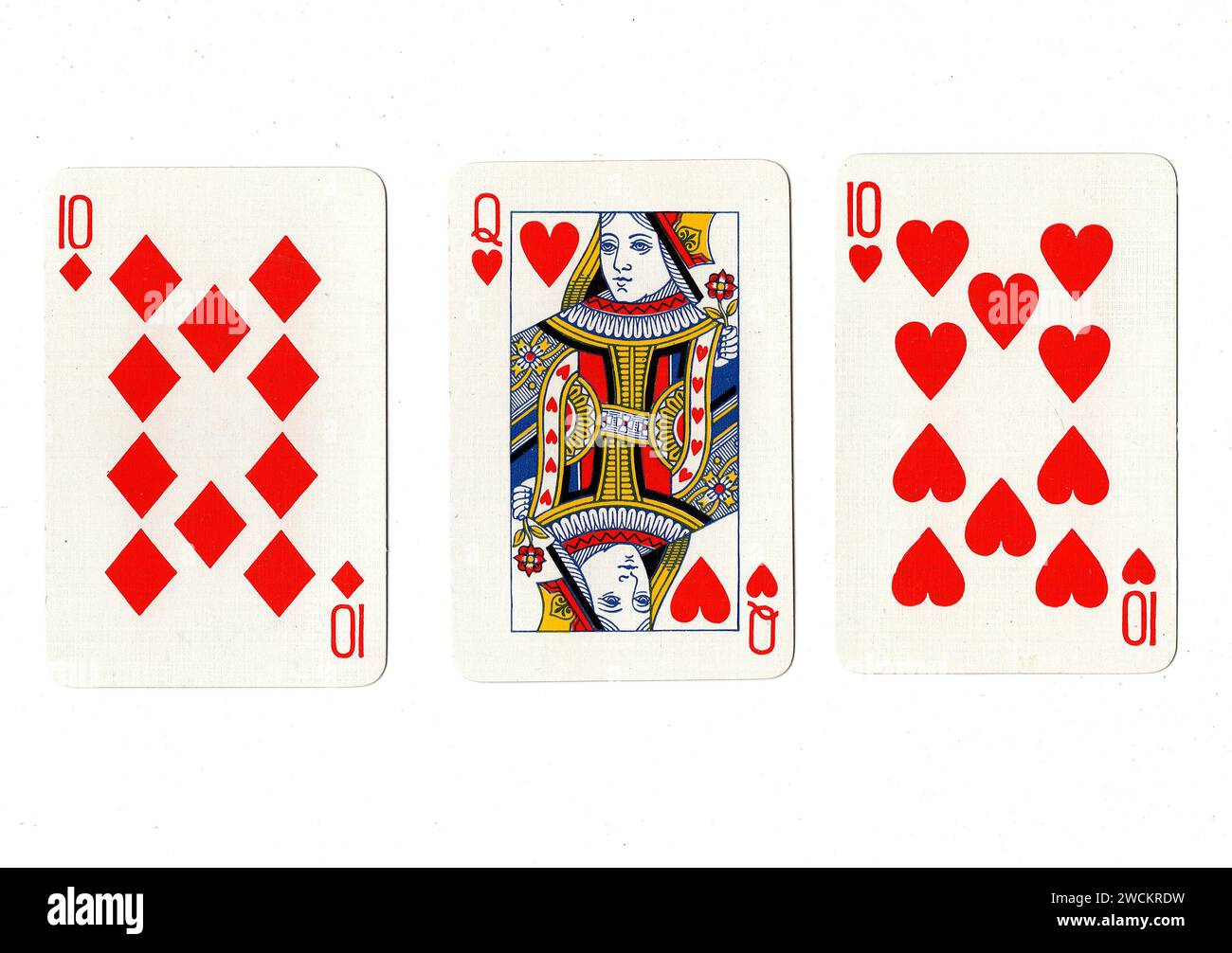 Vintage playing cards showing a pair of red tens and a red queen ...