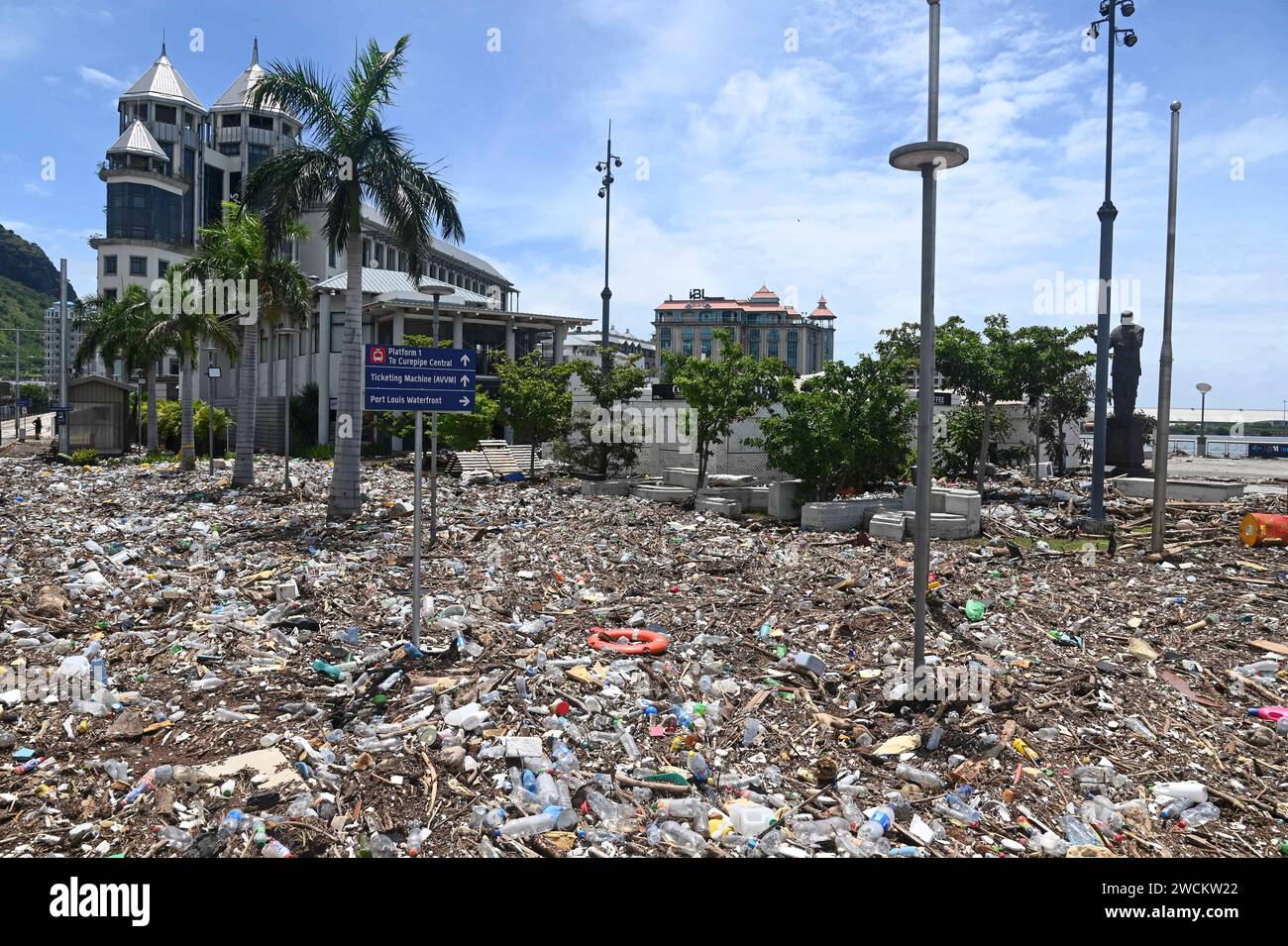 Debris washed up during the cyclone is strewn across the Caudan ...
