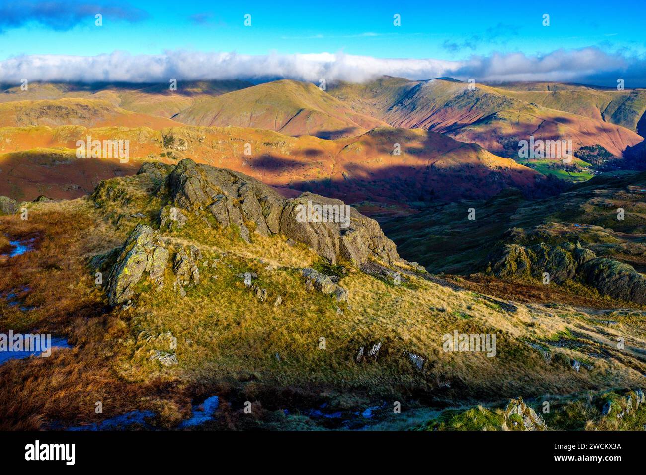 View towards the Helvellyn and Fairfield fells in the Lake District ...