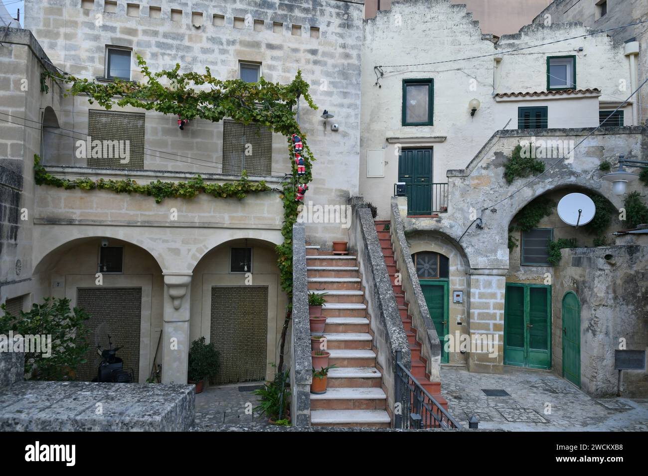 Facade of an old house in Matera, an ancient city in Basilicata, Italy ...