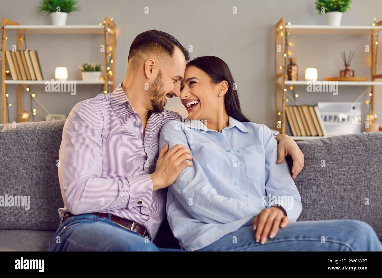 Happy people in love expression sitting close, showing romantic moment ...