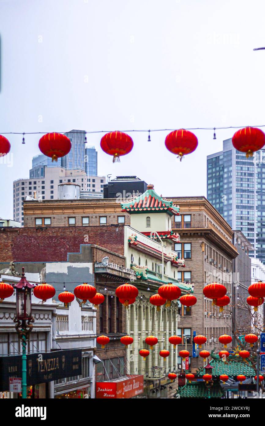 Red Chinese lanterns hanging over a street in Chinatown, San Francisco ...