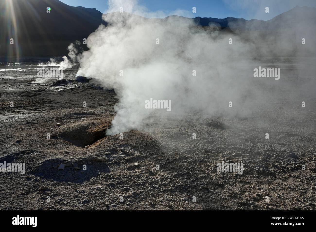 Steam rising from the ground at The Geysers Del Tatio, Antofagasta ...