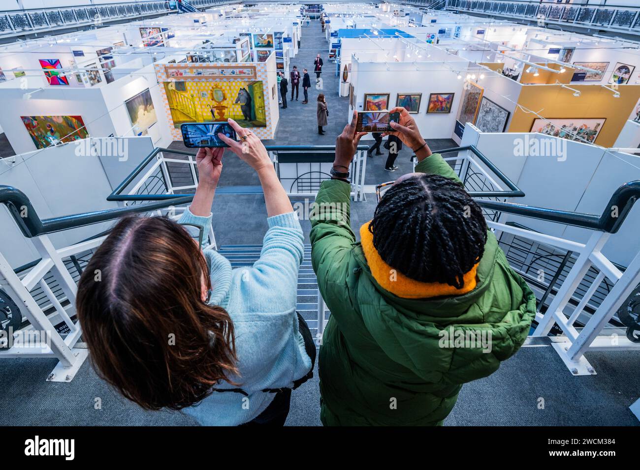 London, UK. 16th Jan, 2024. Visitors capture the space on their mobile ...