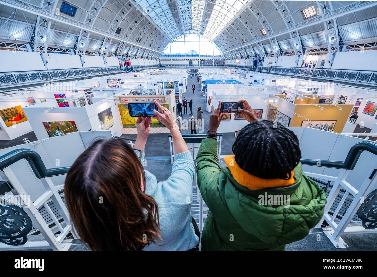 London, UK. 16th Jan, 2024. Visitors capture the space on their mobile ...