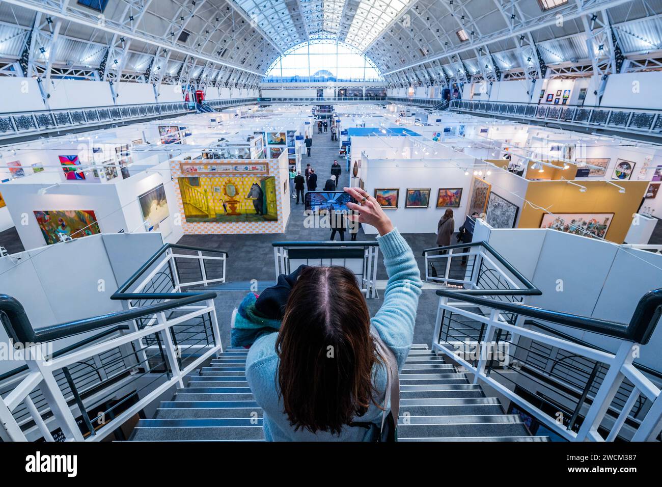 London, UK. 16th Jan, 2024. Visitors capture the space on their mobile ...