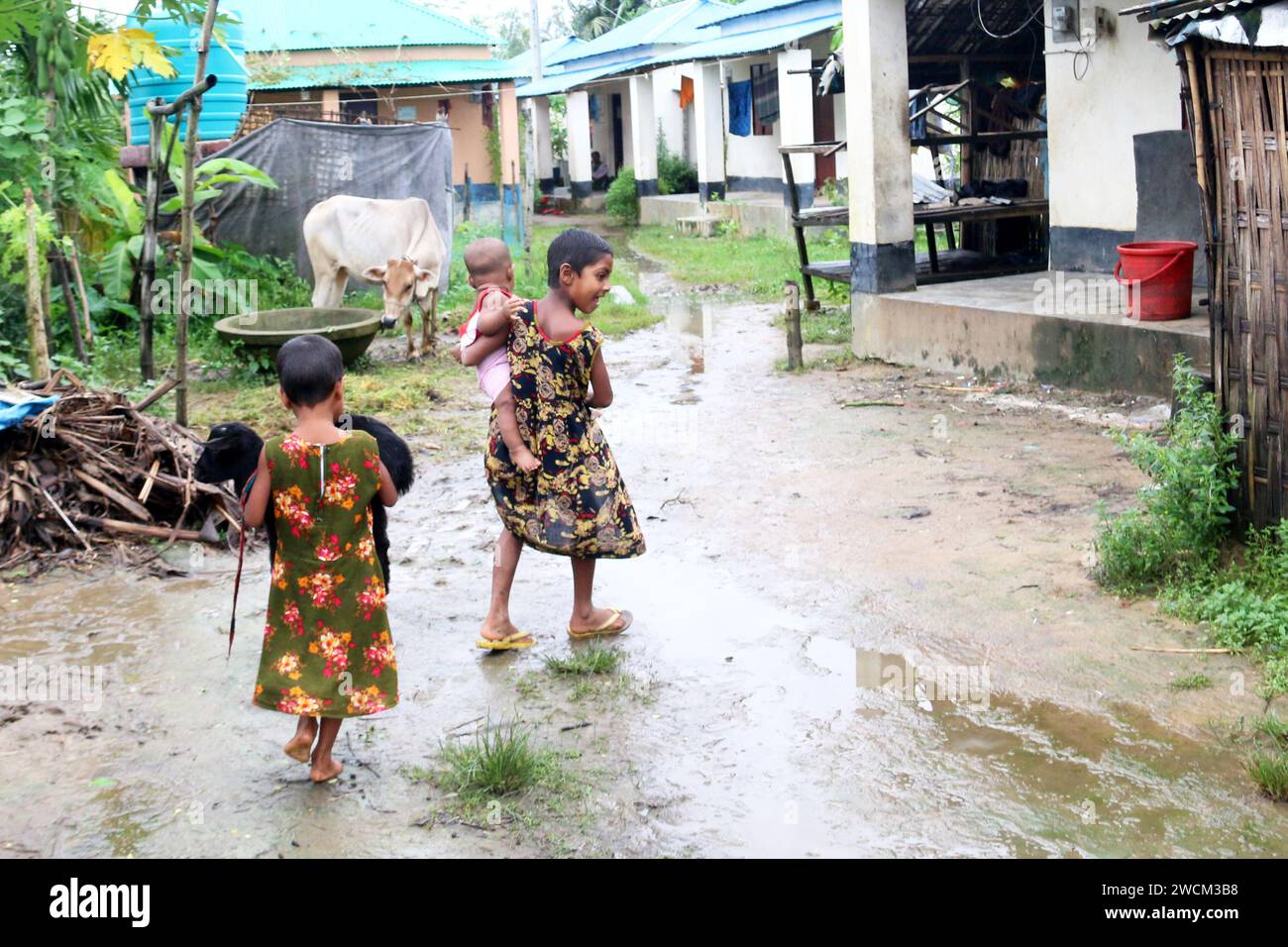 Rural Bangladeshi children happily playing in the neighborhood. Gucchogram, Jhinaigati, Sherpur ...