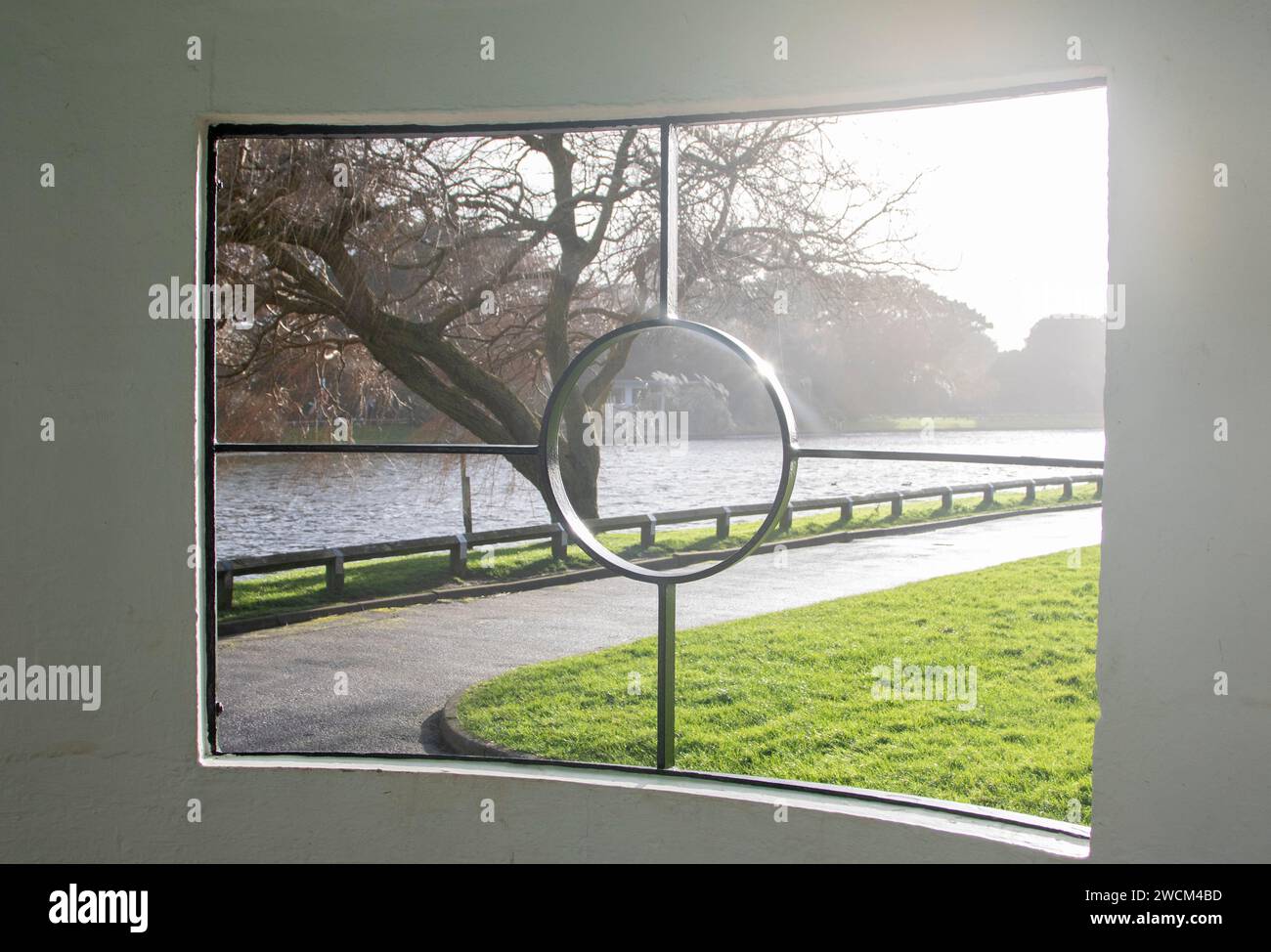 Looking out of the unglazed window of a charming 1930s art deco window ...