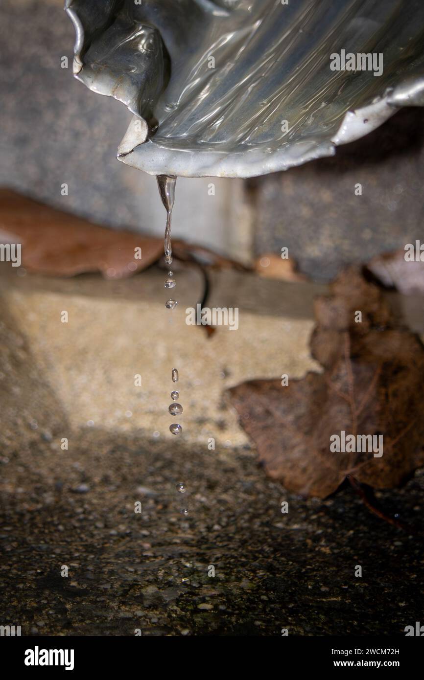 Water Droplets Dripping from Storm Drain Stock Photo - Alamy