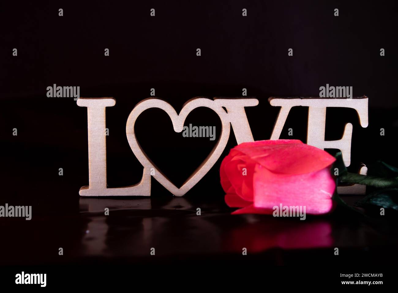 Wooden Love Sign with Rose Stock Photo - Alamy