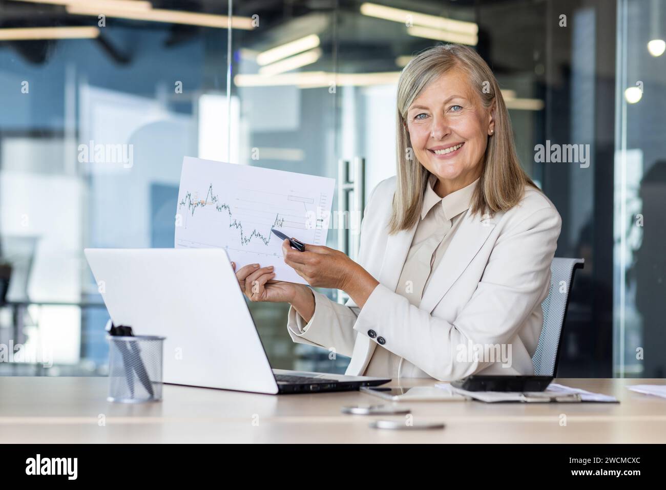 Portrait professional working on graphs hi-res stock photography and ...
