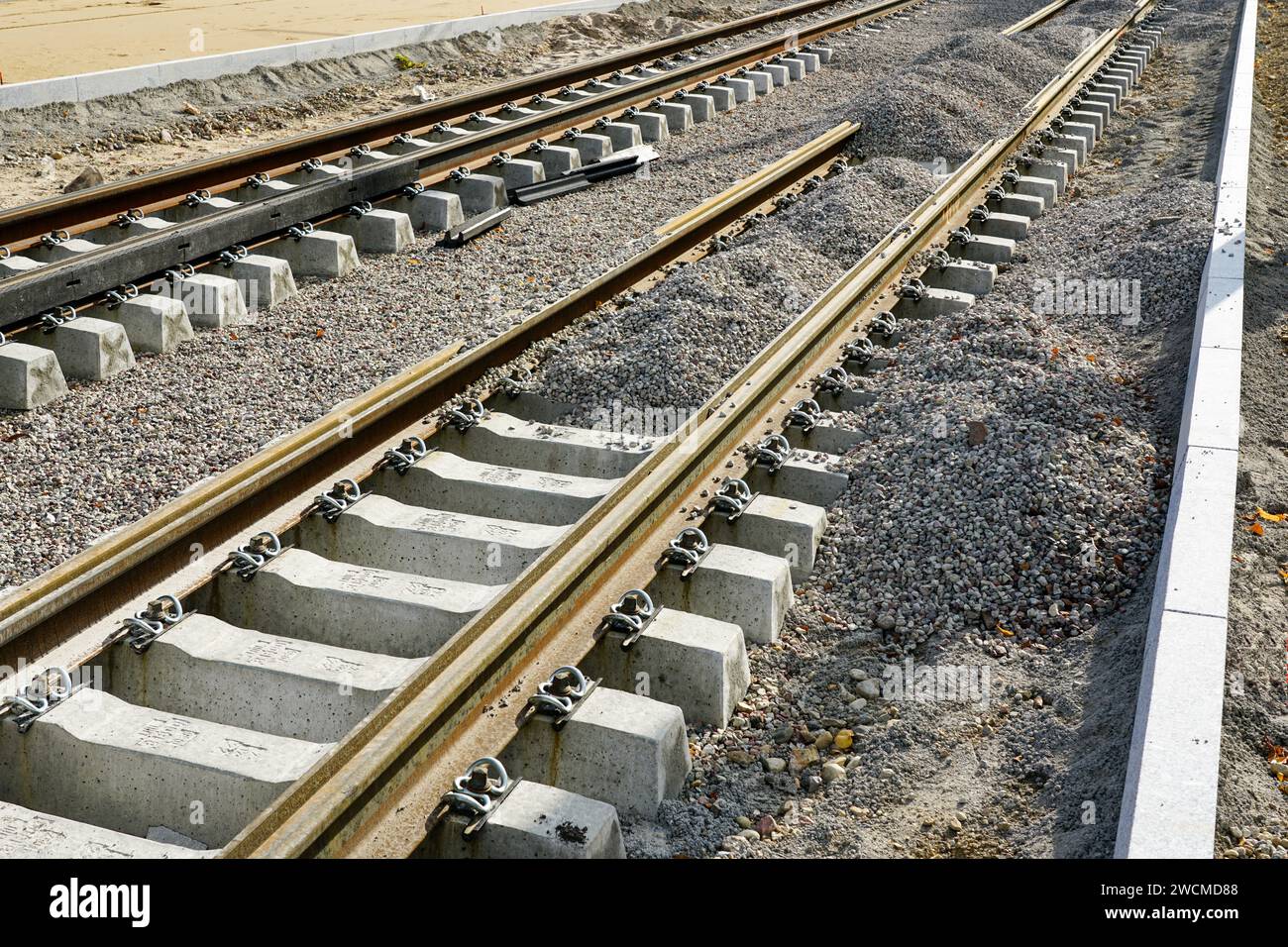 Laying new tram rails on new concrete sleepers with pads that reduces ...