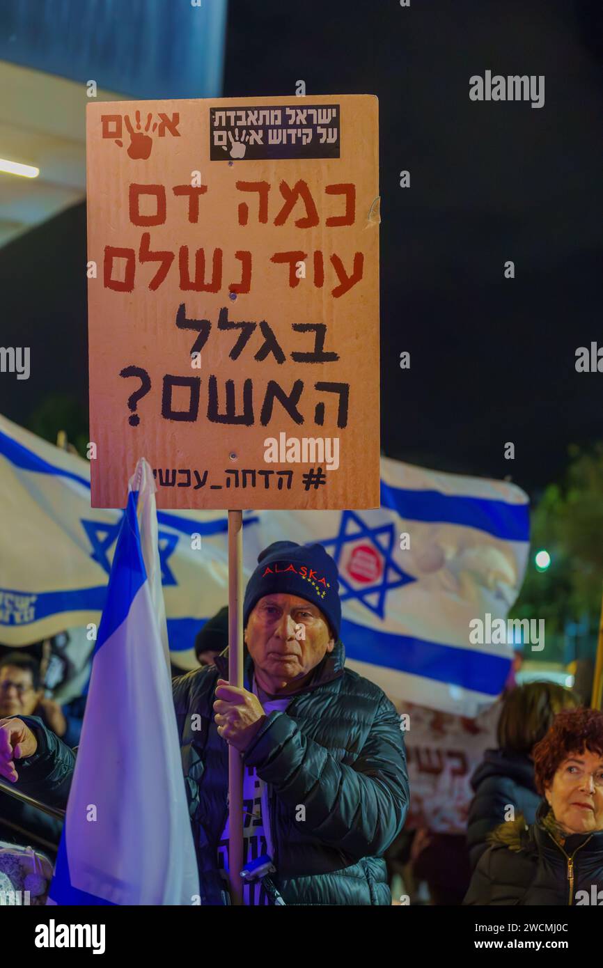Haifa, Israel - January 13, 2024: People with various signs and flags ...