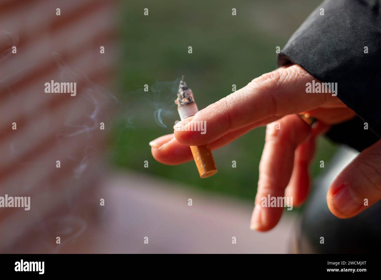 Finger cigarette hi-res stock photography and images - Alamy