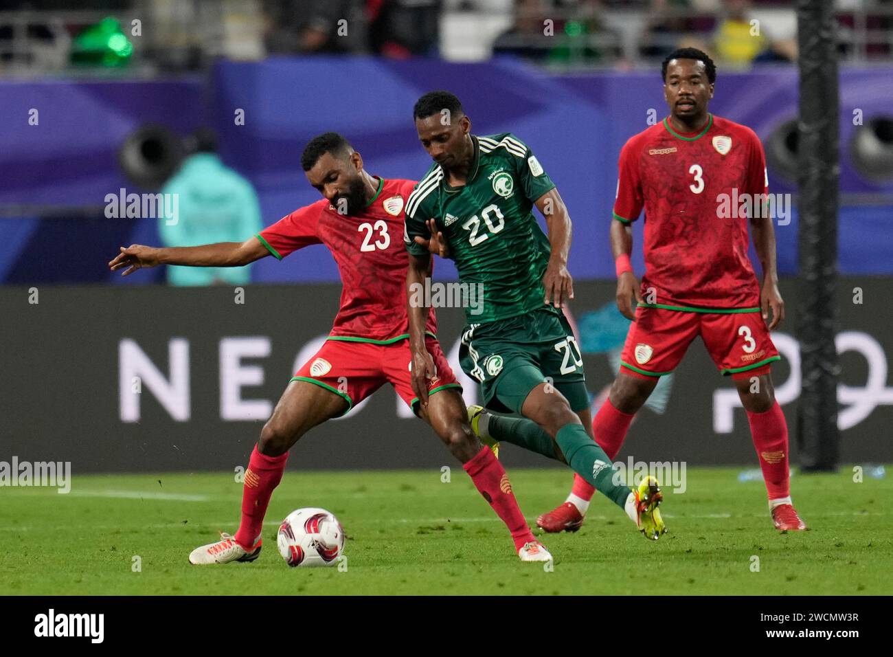 Oman's Harib Jamil Al Saadi, left, tries to stop Saudi Arabia's ...