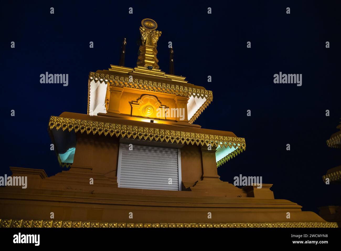 Rooftop of the Mahamevnawa Amawatura Monastery are under night sky ...