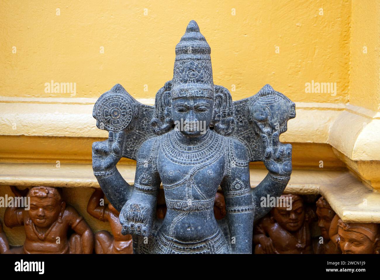Ancient statue at the entrance of Gangaramaya Temple, it is one of the ...