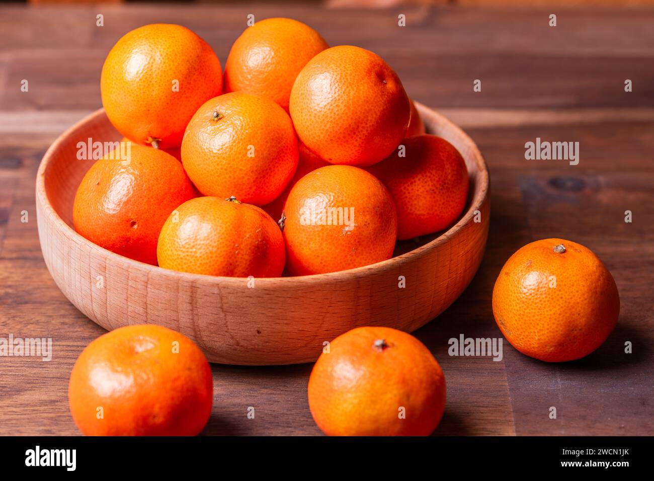clementine mandarin fruit. mandarins in the wooden bowl Stock Photo - Alamy