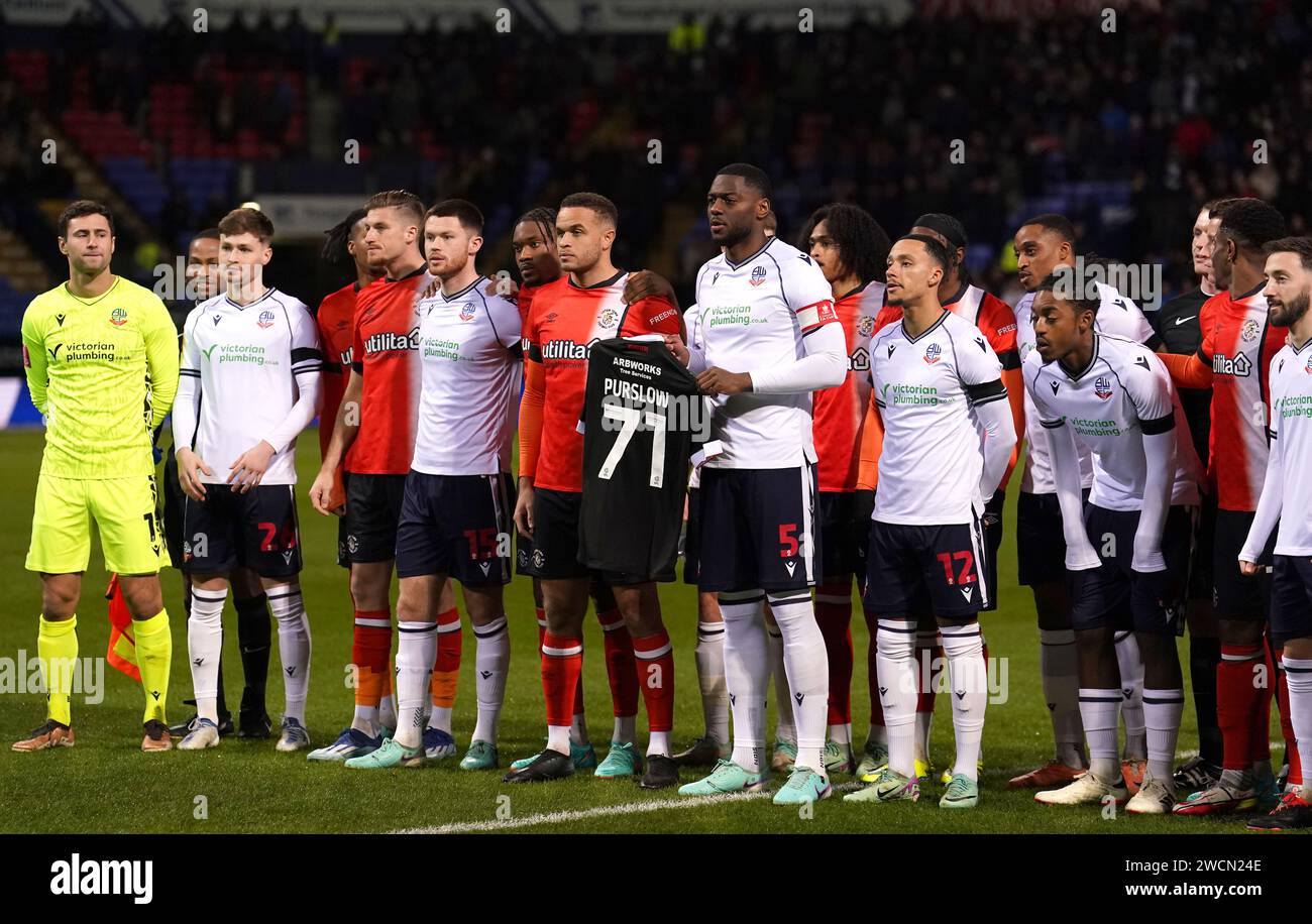 The team captains of Bolton Wanderers and Luton Town hold up a shirt ...