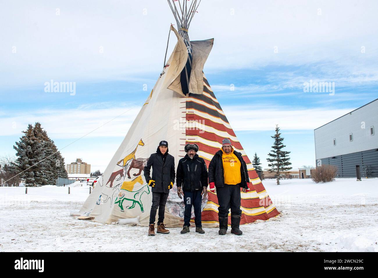 Saskatoon, Can. 16th Jan, 2024. Firekeepers Tommy Standing, left to ...