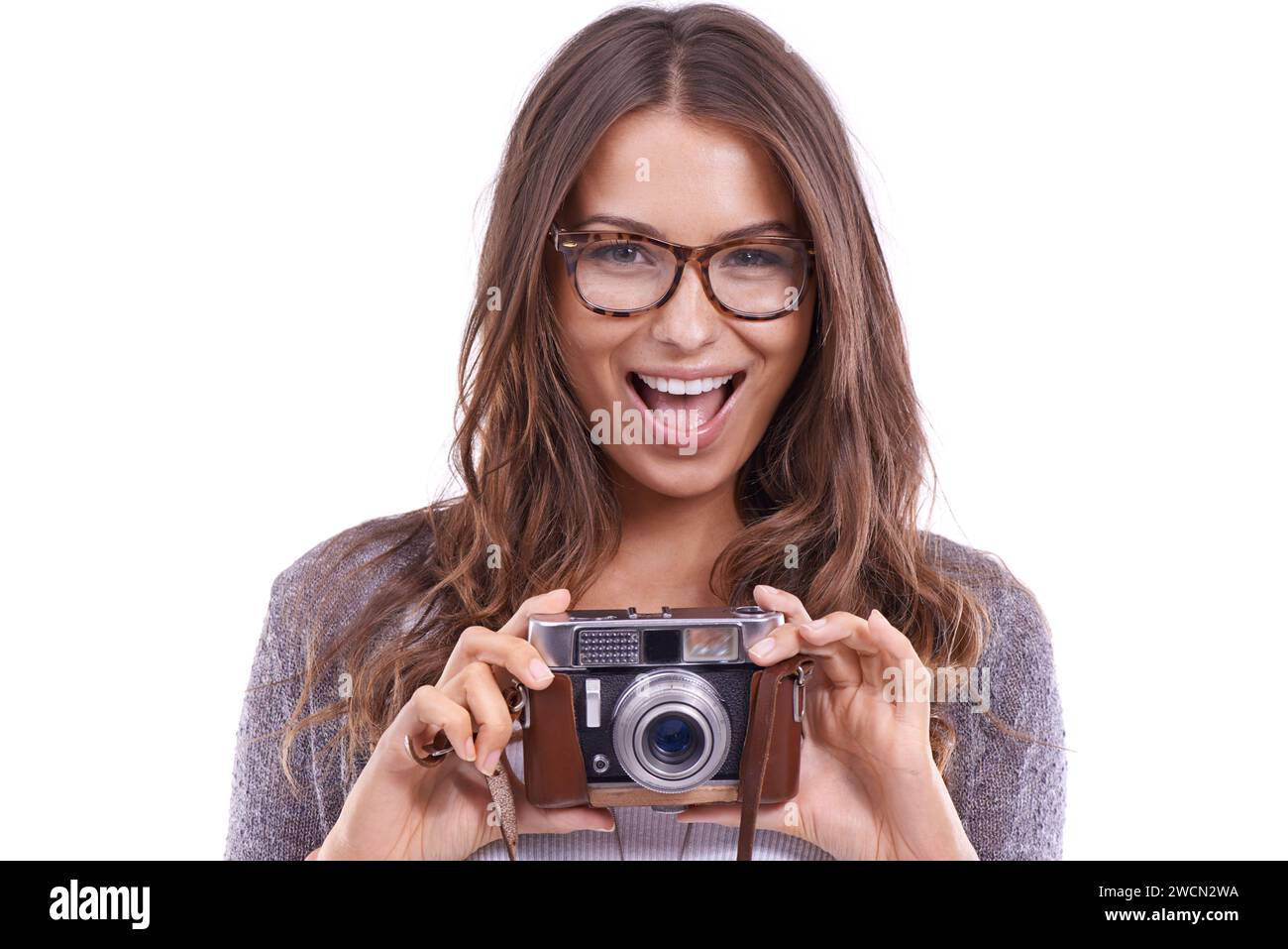 Photographer, excited woman and retro camera in studio for photoshoot ...
