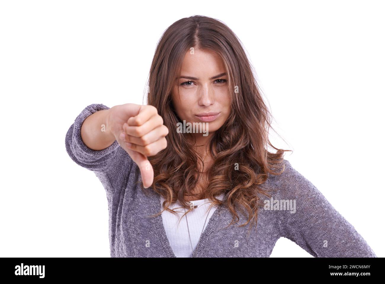 Thumbs down, portrait and hands of woman in studio for rejection of bad ...