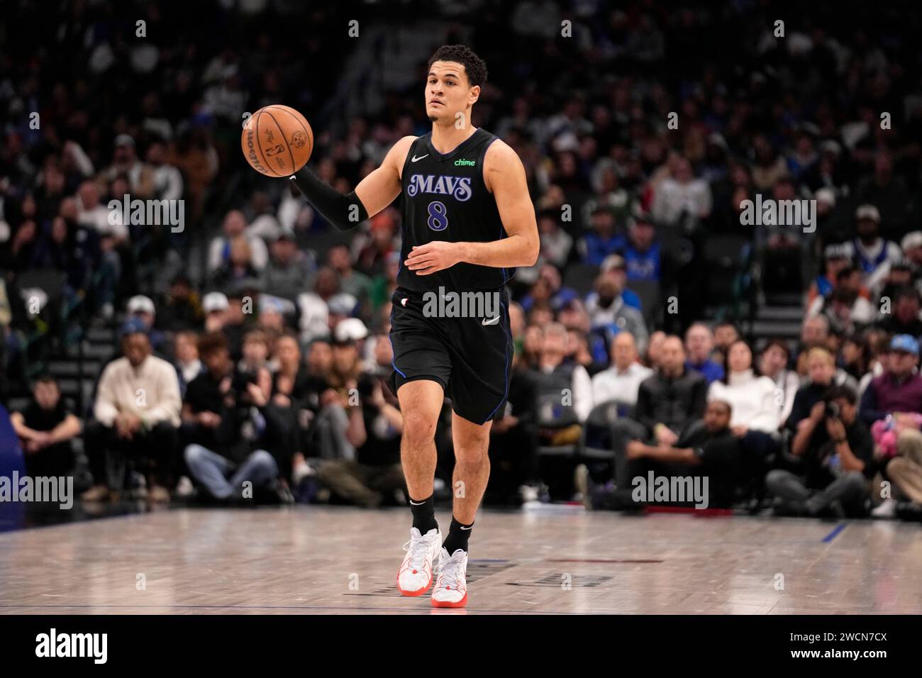 Dallas Mavericks guard Josh Green advances the ball up court during an ...