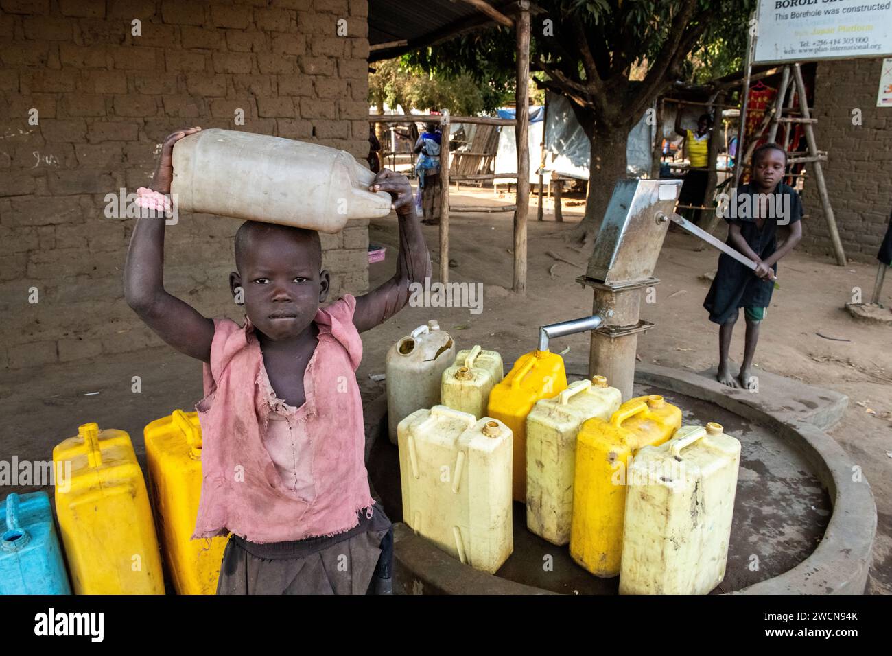 Children pumping hi-res stock photography and images - Alamy