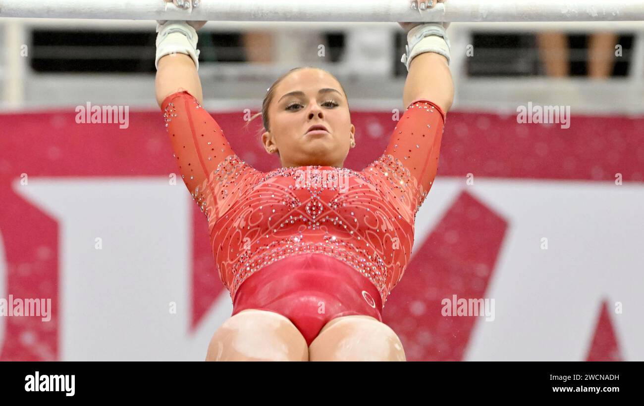 Arkansas gymnast Cally Swaney competes on the bars during an NCAA ...