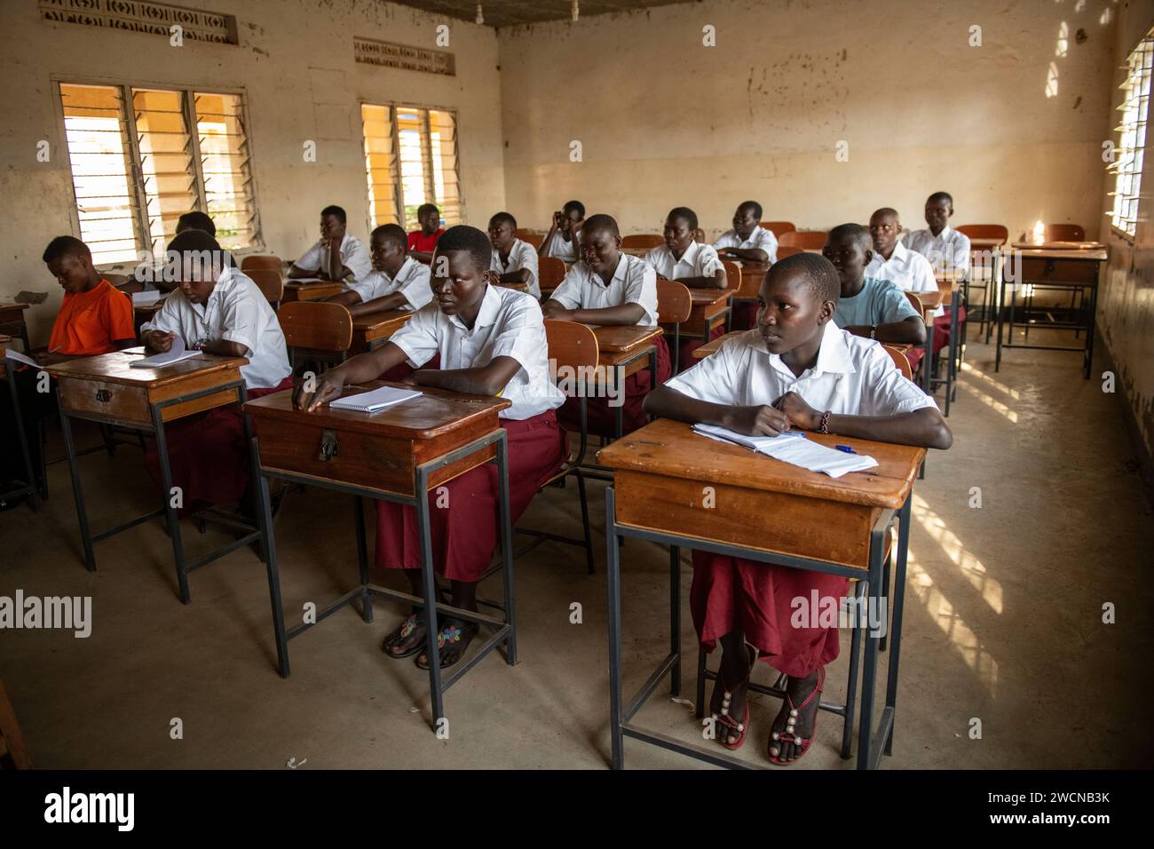 Uganda. Students learn in a schoolroom. Editorial use only Stock Photo ...