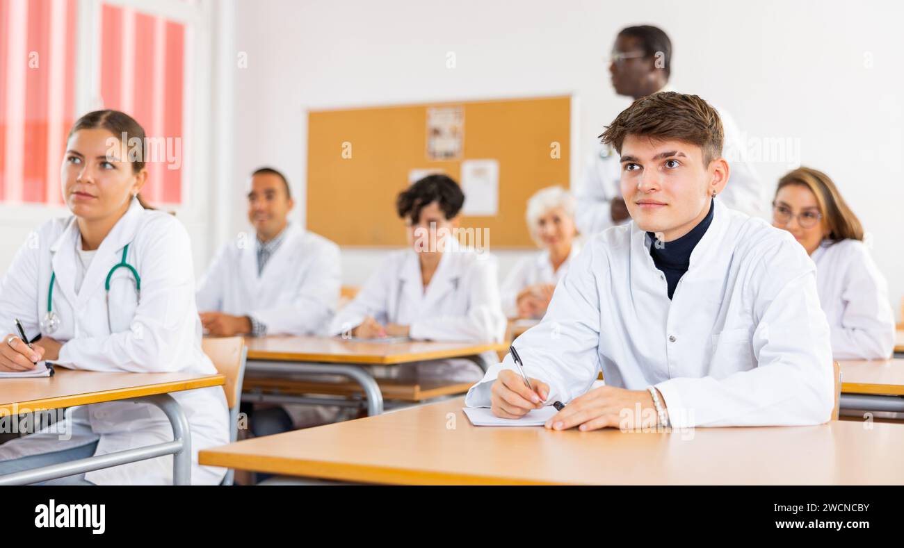 Group of medical students in classroom Stock Photo - Alamy
