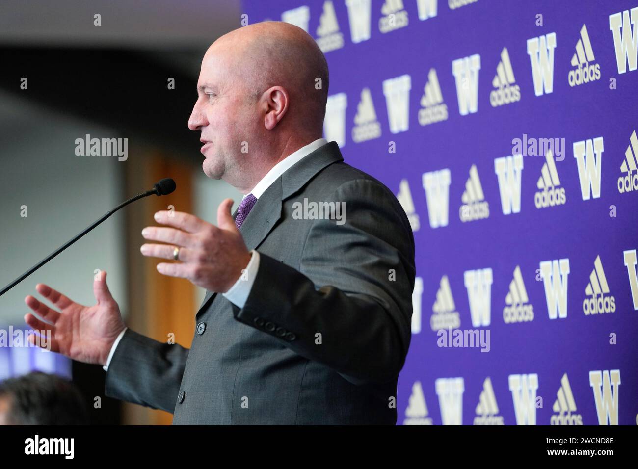 Washington athletic director Troy Dannen speaks before introducing new ...