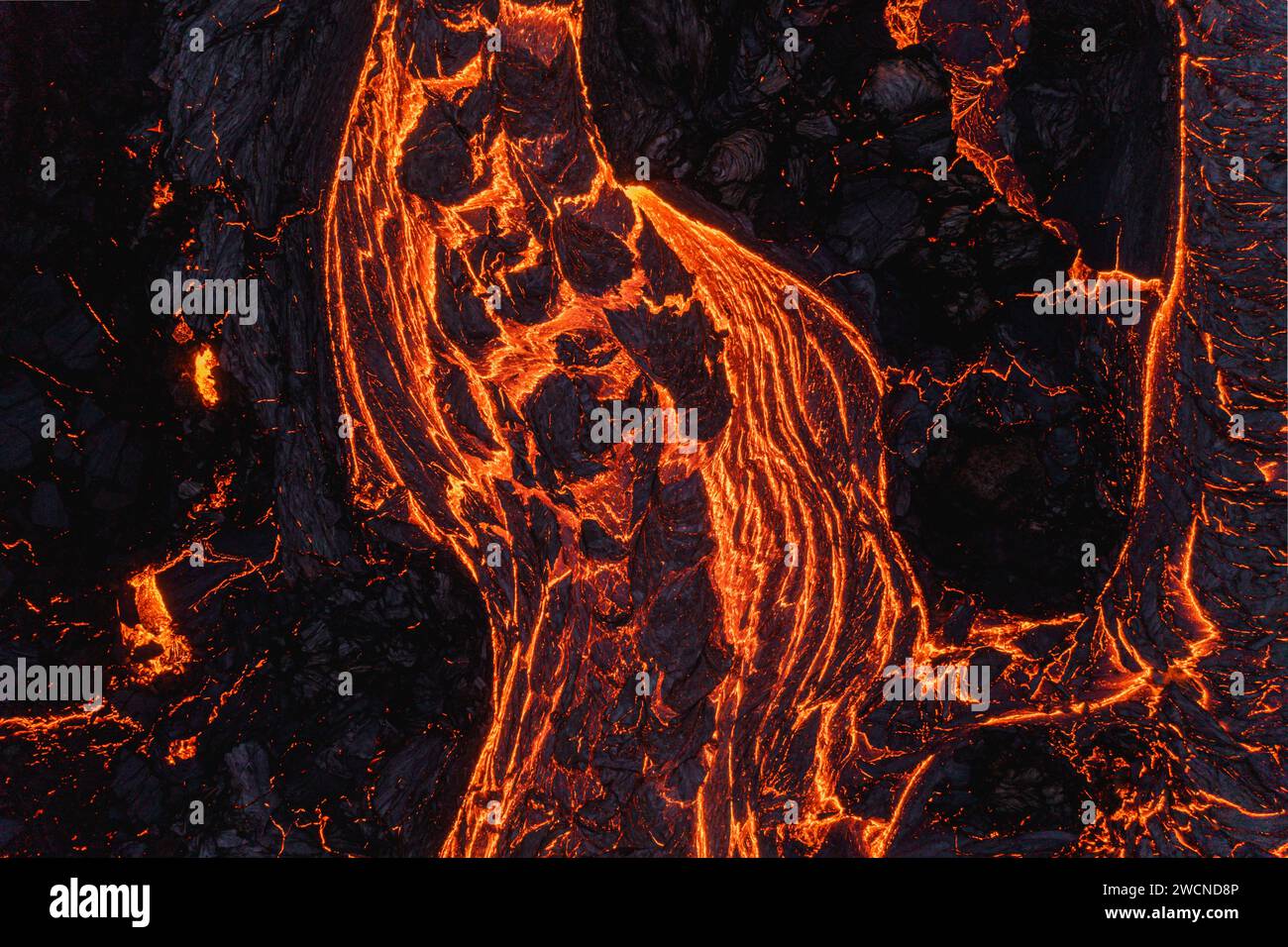 Aerial View of lava river during volcanic eruption at Fagradallsfjall ...