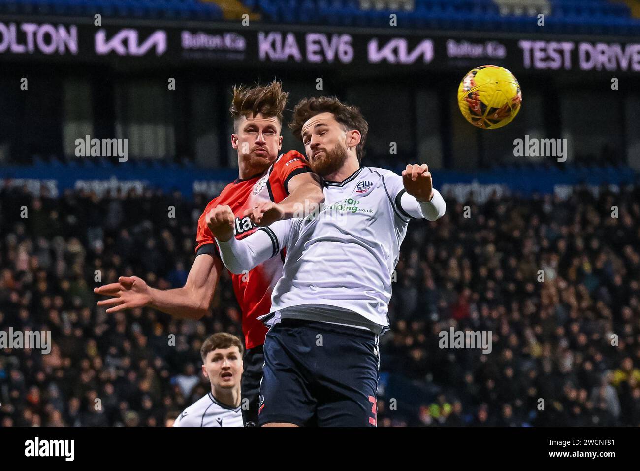 Jack Iredale of Bolton Wanderers and Reece Burke of Luton Town battle ...