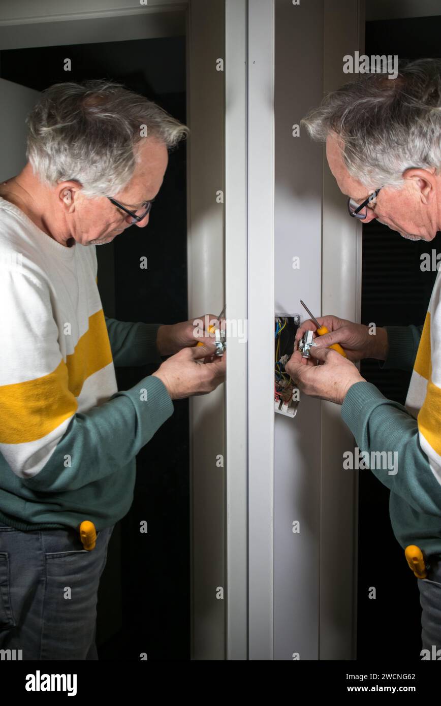 An Electrician Tests The Electrical Installations And Wires Of The Relay Protection System