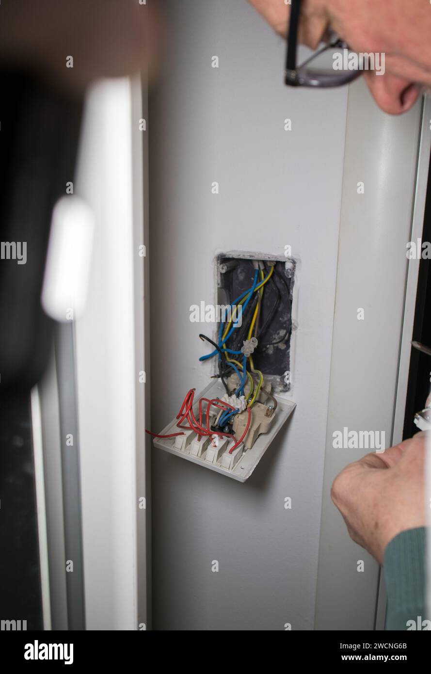 An Electrician Tests The Electrical Installations And Wires Of The Relay Protection System