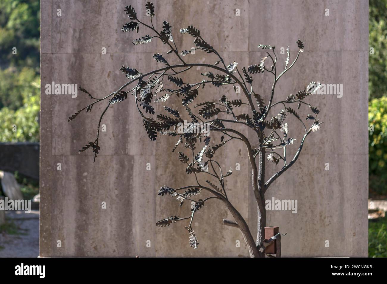 Wrought-iron tree with leaves on a grave, Staglieno Monumental Cemetery ...