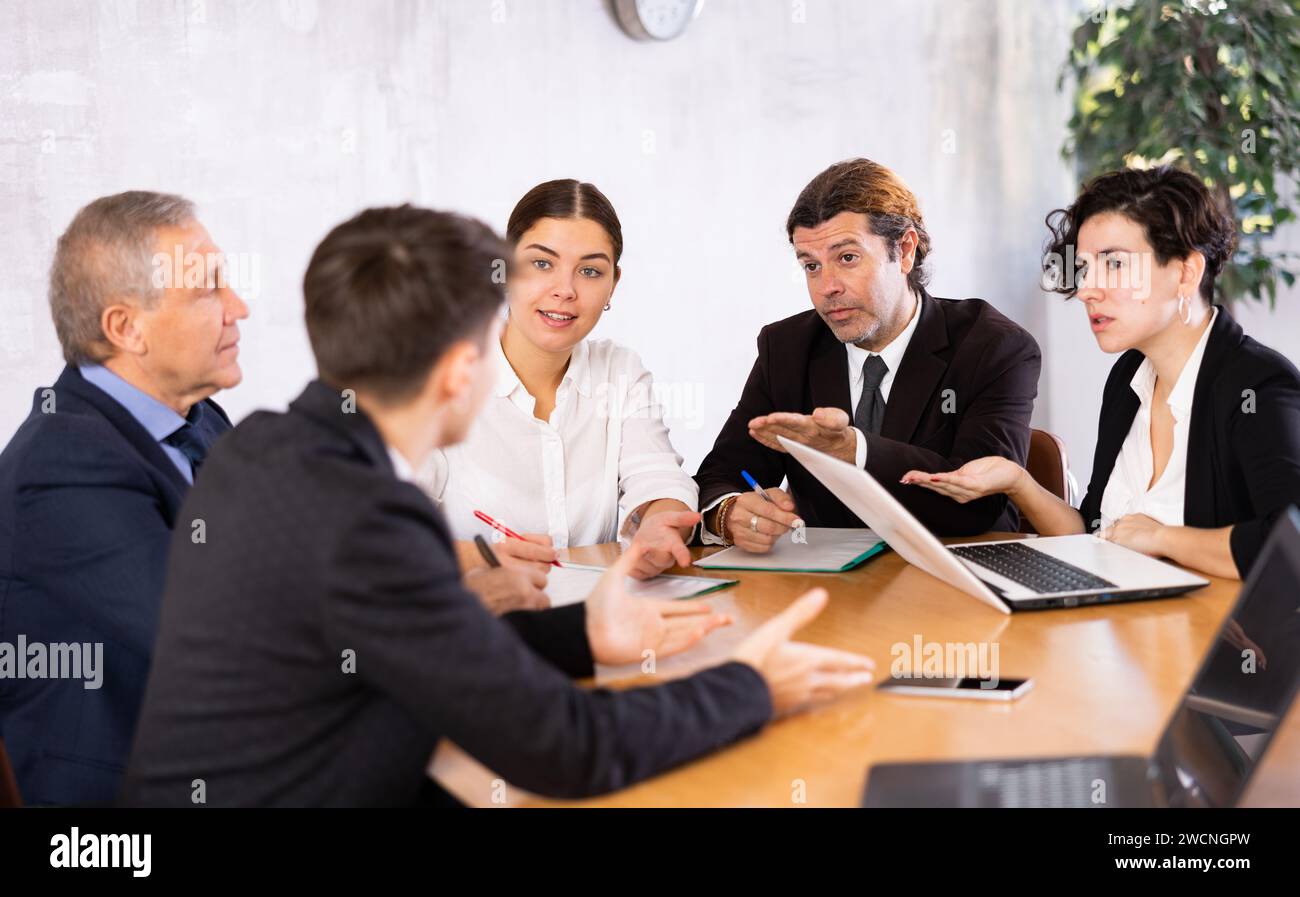 Meeting of top managers in meeting room in modern office Stock Photo ...