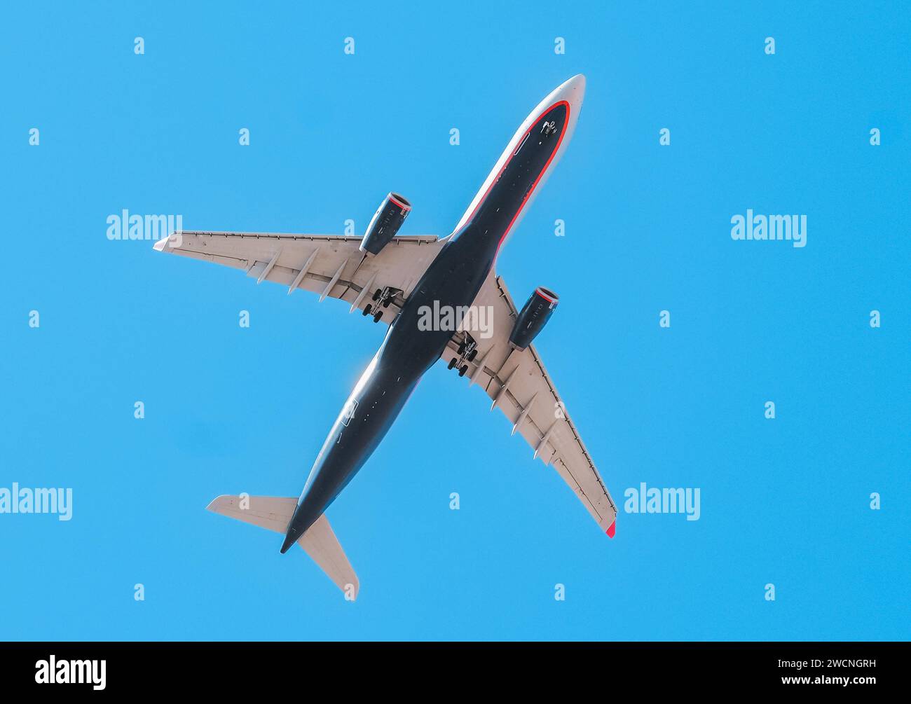 Passenger civil airplane jet flying at flight level high in the sky ...