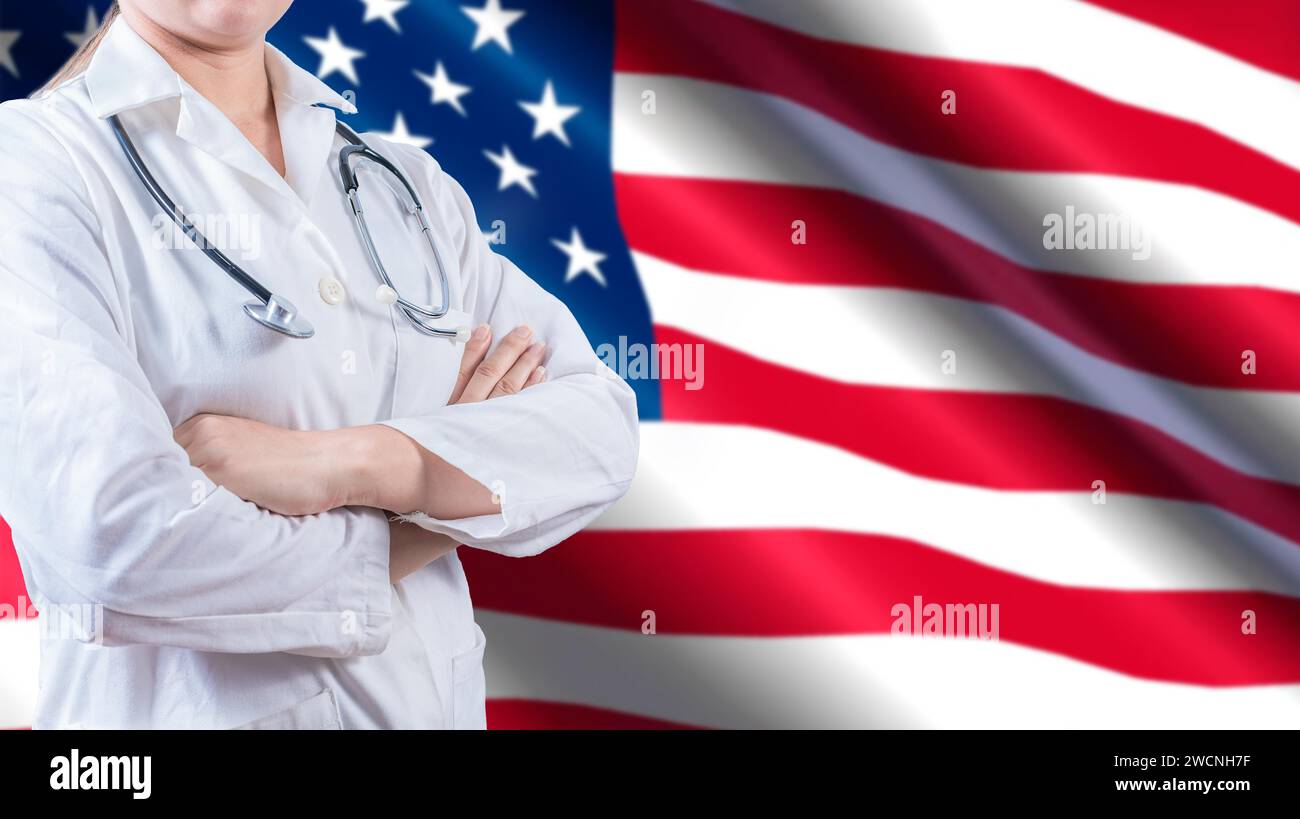 Unrecognizable female doctor with arms crossed on American flag, Health ...