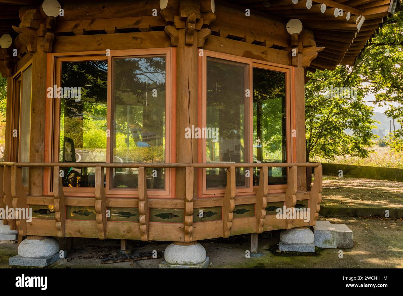 Enclosed wooden picnic pavilion located in a woodland park Stock Photo ...