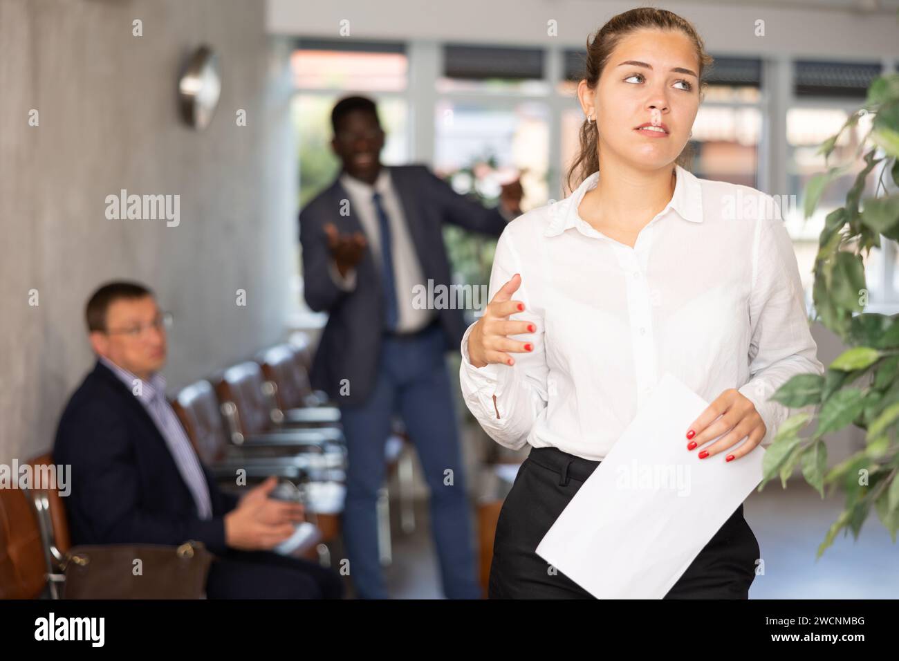 Angry hot-tempered boss shouts yells at hired employee girl in office ...