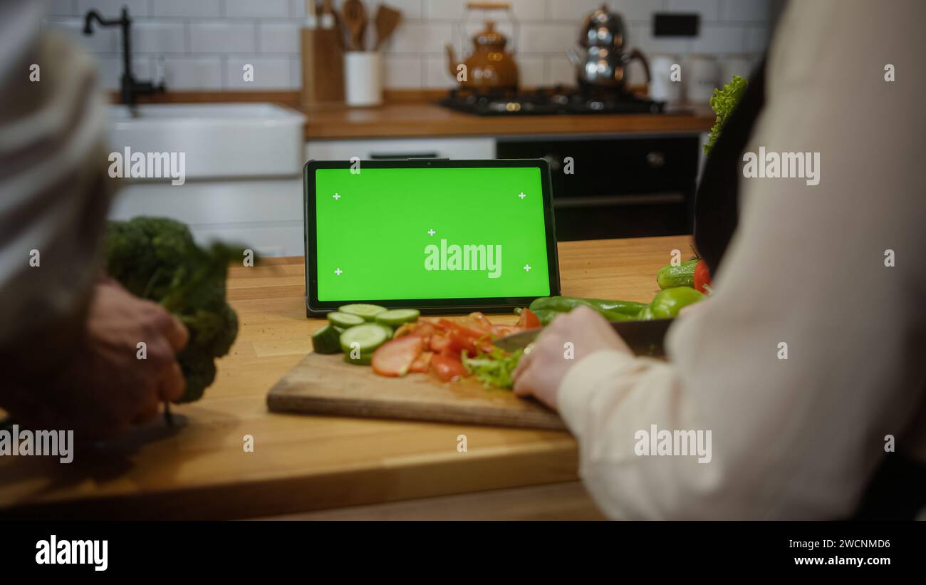 Tablet computer with mock up green screen chroma key display on the ...