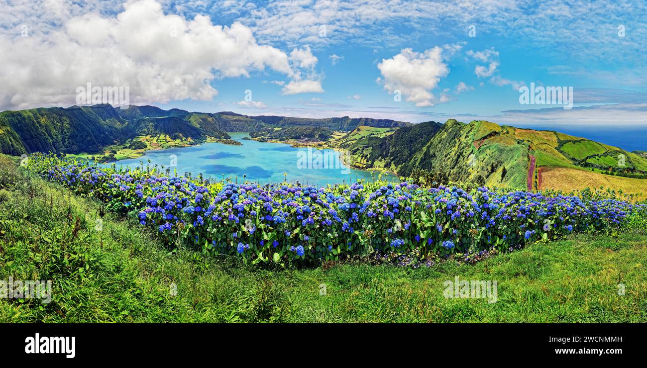 Panoramic view of the crater lake Lagoa Azul with the green overgrown ...