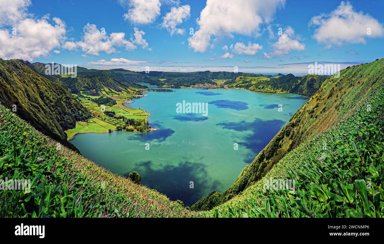 Panoramic view of the peaceful crater lake Lagoa Azul surrounded by ...